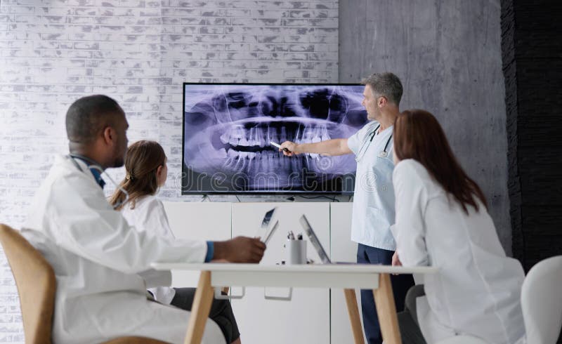 Dentist Doctors Looking at Teeth Xray Stock Image - Image of dentist ...