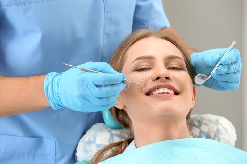 Dentist Examining Patient S Teeth in Clinic Stock Photo - Image of ...