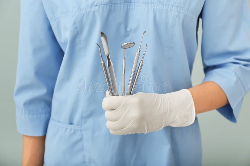 Dentist Holding Stainless Instruments, Closeup Stock Photo - Image of ...