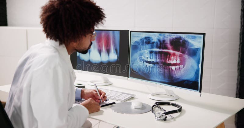 Dentist Looking at Teeth Xray Scan Stock Image - Image of hand, side ...