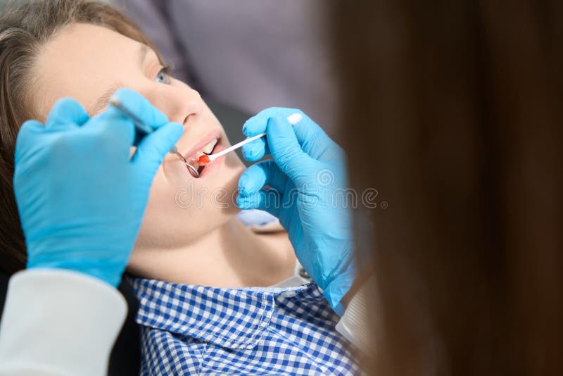 Dentist Makes Child Application Anesthesia with Special Red Paste Stock ...