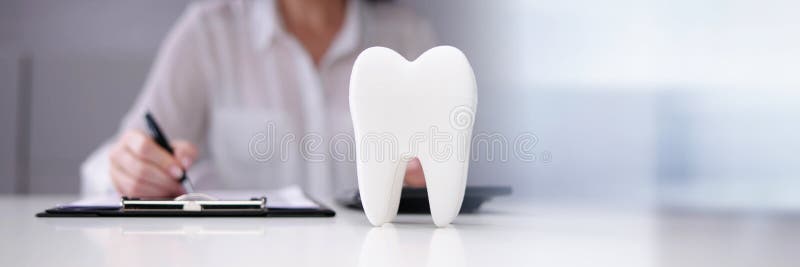 Dentist Paperwork at Desk in Front Stock Photo - Image of banner ...