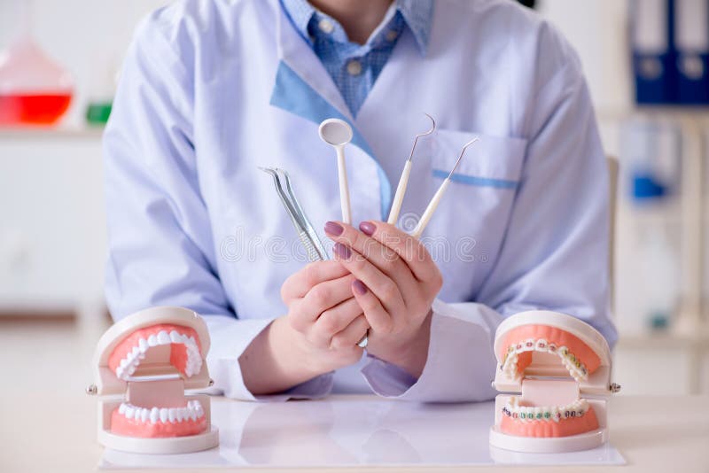 The Dentist Practicing Work on Tooth Model Stock Image - Image of ...