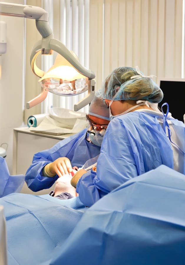 Dentist with Team for Training in the Dental Clinic Stock Photo - Image ...