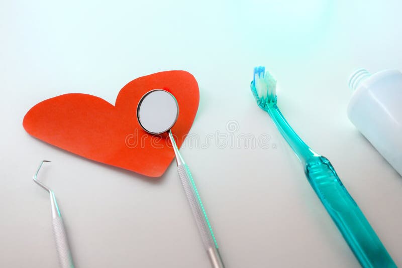 Dentist Tools on Table with Heart Top Elevated Stock Image - Image of ...