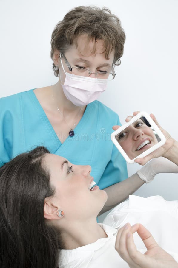 Dentist with Patient, Cleaning and Curing Stock Photo - Image of ...