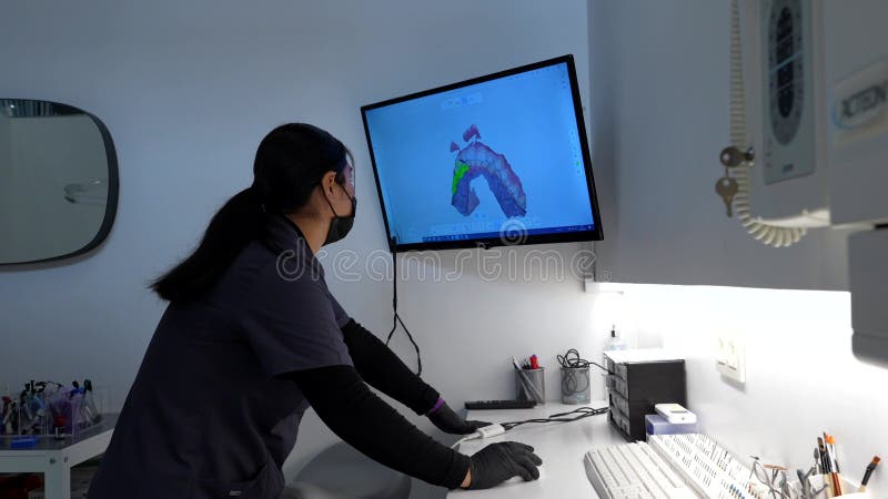 Dentist Analyzing 3d X Ray Scan of Teeth in Dental Clinic Stock Footage ...