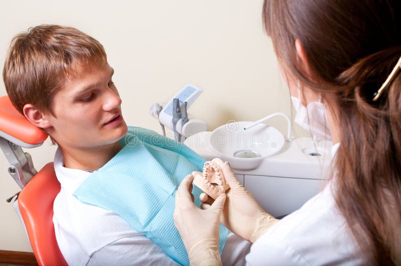 Dentist at work stock photo. Image of caucasian, mouth - 15838784