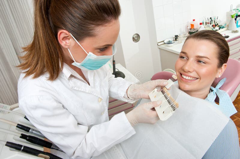 Dentist at work stock photo. Image of dentist, smiling - 19058776