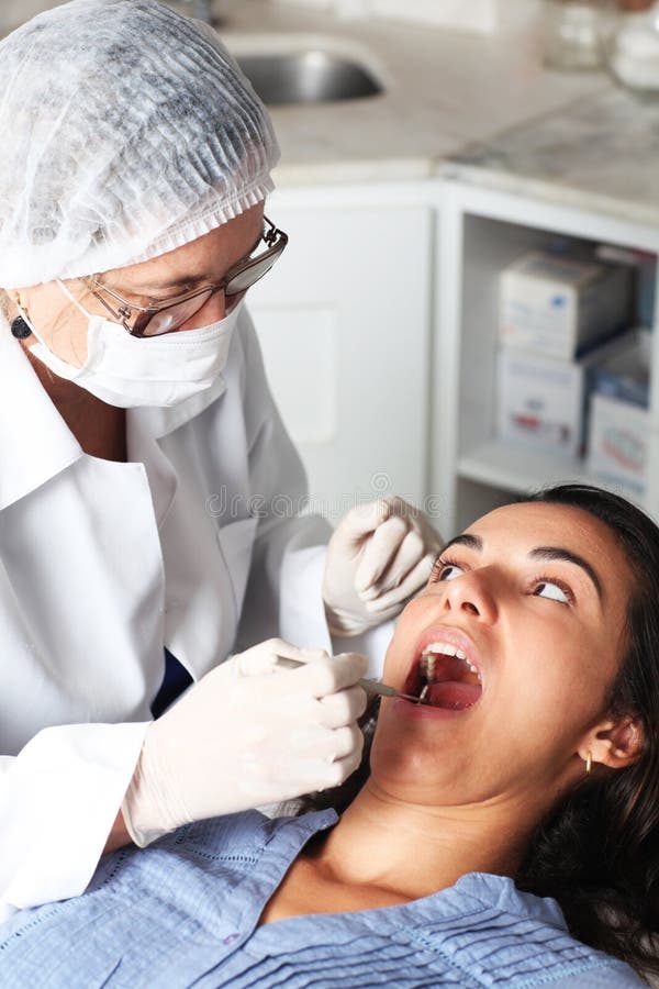 Dentist at work stock photo. Image of clinic, dental - 22878476
