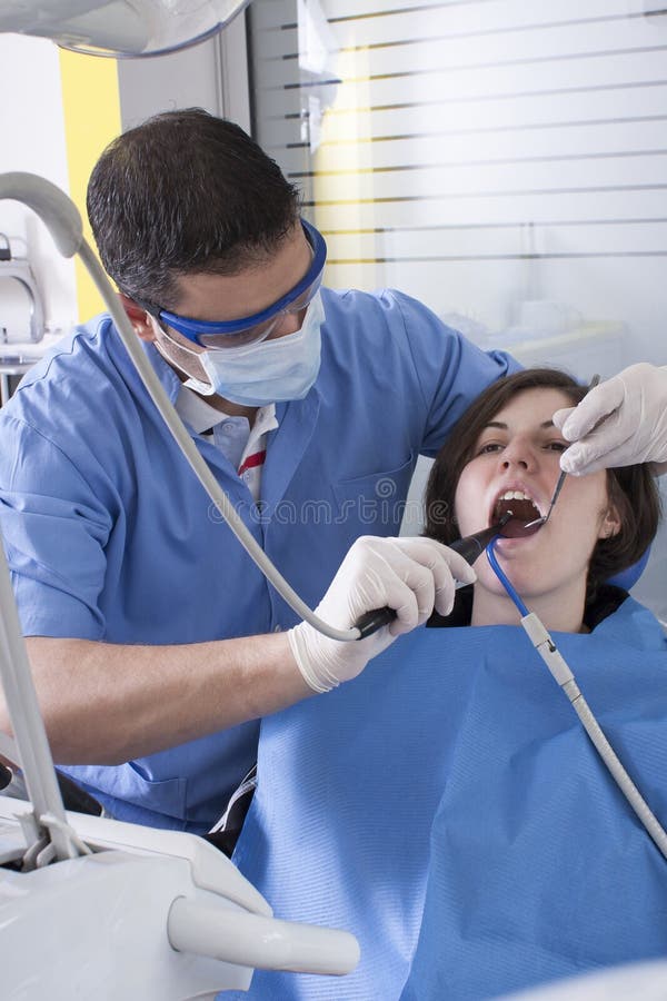 Dentist at work stock image. Image of healthcare, health - 29692347