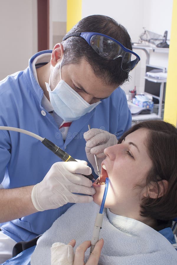 Dentist at work stock photo. Image of healthy, clinic - 29692426