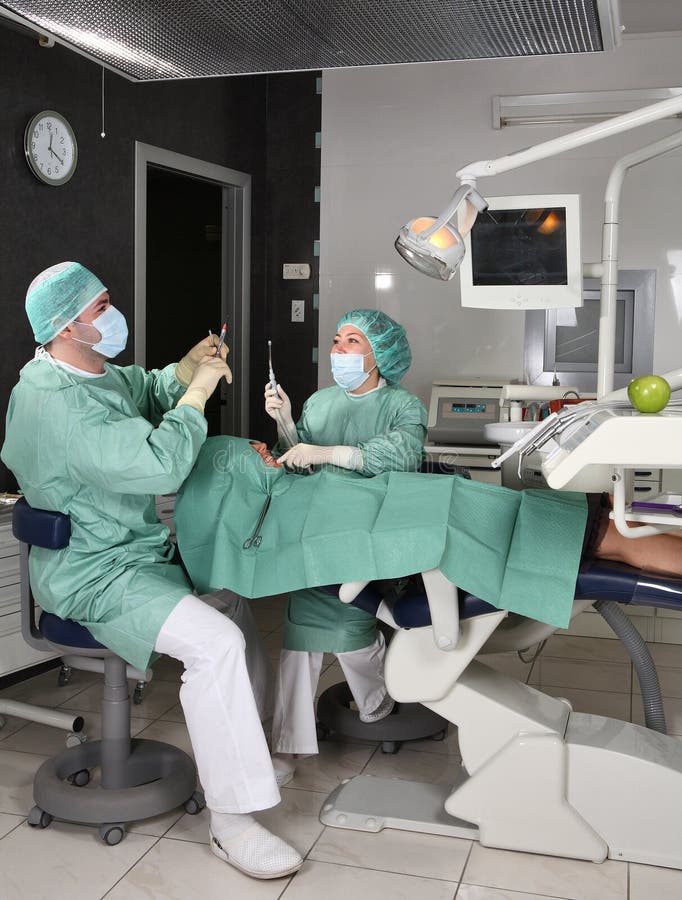 Dentist at work stock image. Image of mask, assistance - 3397643