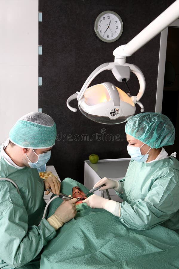 Dentist at work stock image. Image of clinical, oral - 17034531