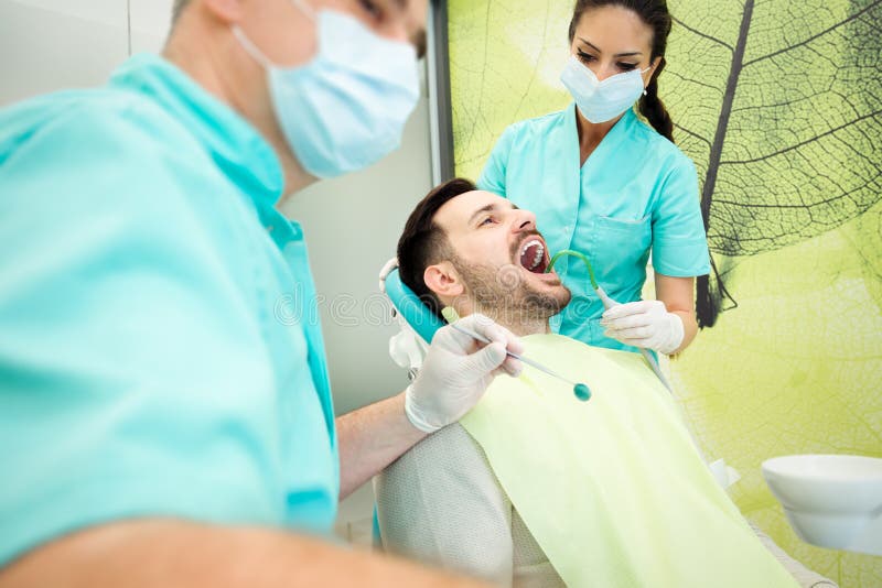 Dentist at work stock image. Image of dental, person - 90890381