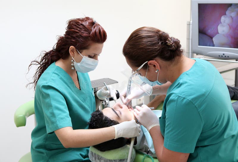 Dentist at Work in Dental Room Stock Photo - Image of aseptic, examine ...