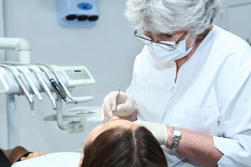 Dentist at Work in Dental Room Stock Photo - Image of dentistry, hand ...
