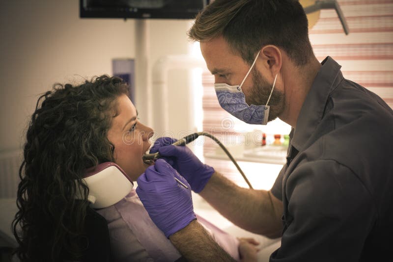 Dentist at work stock photo. Image of caucasian, mouth - 15838784