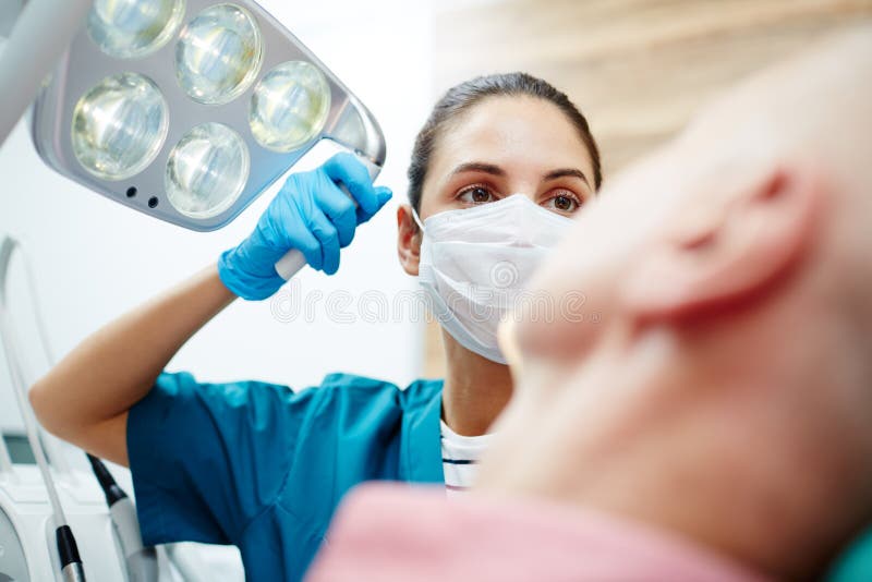 Dentist at work stock image. Image of hospital, specialist - 105094671
