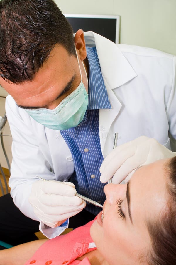 Dentist working stock image. Image of checkup, dentist - 11099199