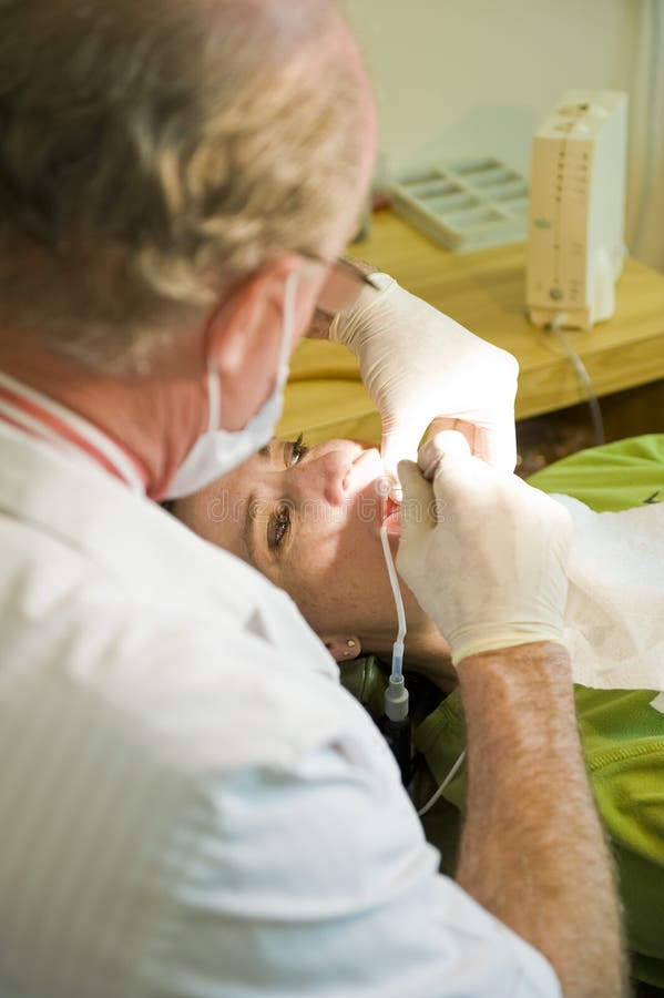 Dentist working stock image. Image of dental, treatment - 6177779