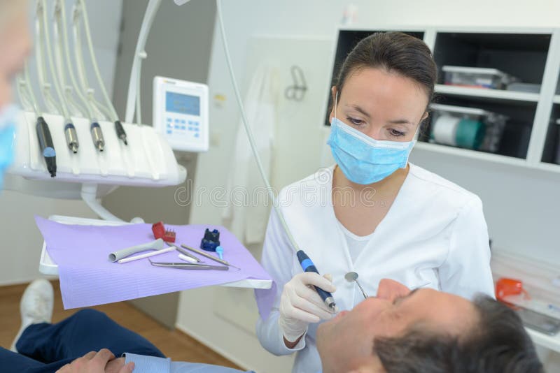 Dentist Working on Patient`s Teeth Stock Image - Image of tool, surgery ...