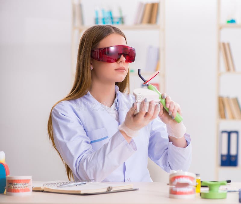 Dentistry Student Practicing Skills in Classroom Stock Photo - Image of ...