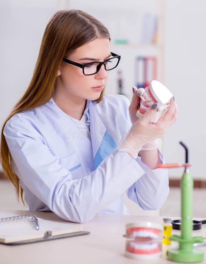 Dentistry Student Practicing Skills in Classroom Stock Photo - Image of ...