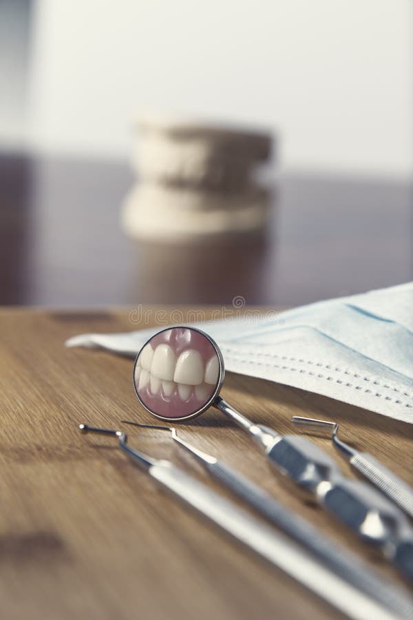 Dentists Tools Lying on a Wooden Desk Stock Image - Image of oral ...