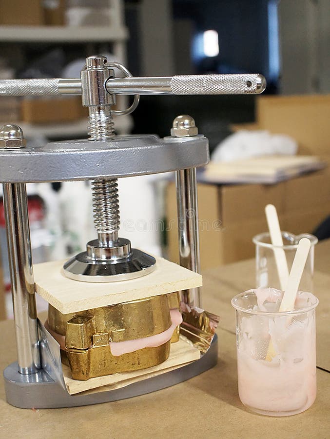 Denture Making Process of Removing from the Mold Stock Photo - Image of ...