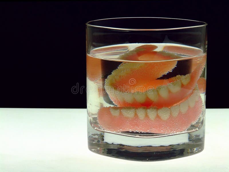 Dentures in a Glass stock image. Image of adult, oldy - 4261921
