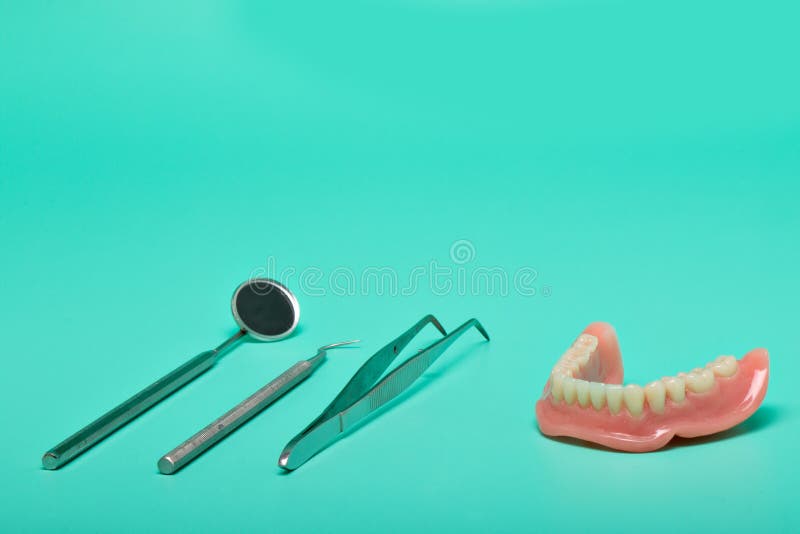Dentures Model with Medical Instruments Stock Photo - Image of ...