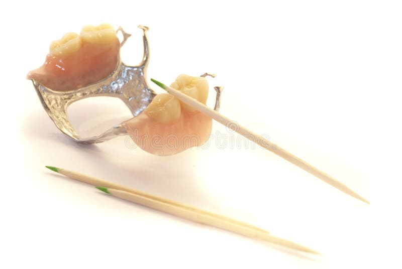 Dentures and toothpicks stock photo. Image of bite, denture - 12762406