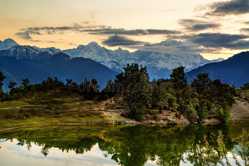 Deoria Tal Lake and Himalayas Stock Image - Image of environment ...