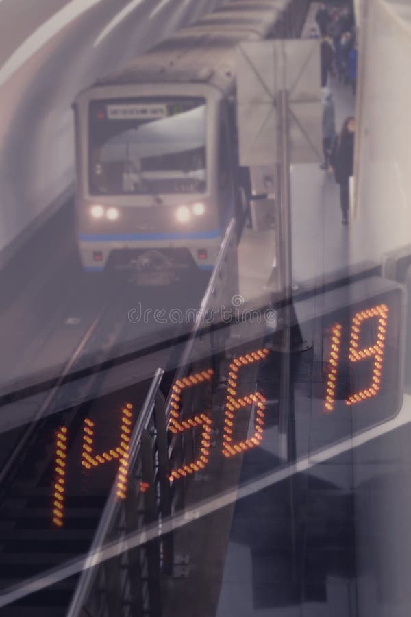 The Departing Metro Train and the Time and Time of the Schedule on the ...