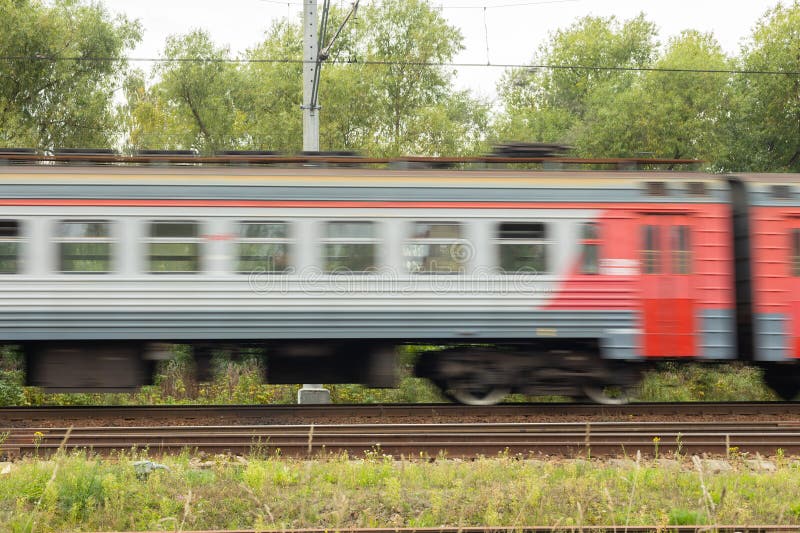 Departing Passenger Train in Motion with Blur Effect Stock Photo ...