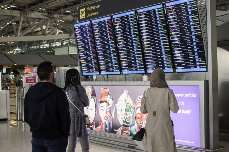 Departure boards editorial photo. Image of family, back - 79784801