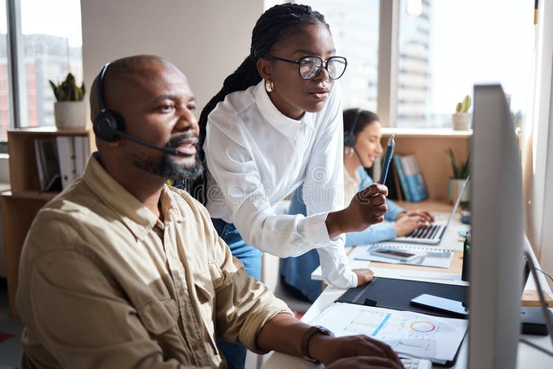 We Depend on Another. a Businessman and Businesswoman Using a Headset ...