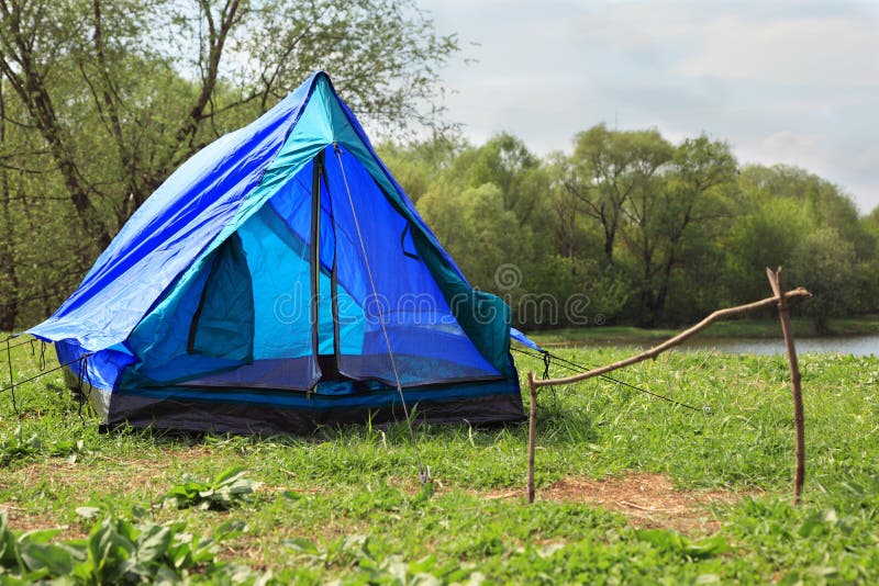 Deployed Tent Stands on River Bank Stock Photo - Image of camp, nature ...