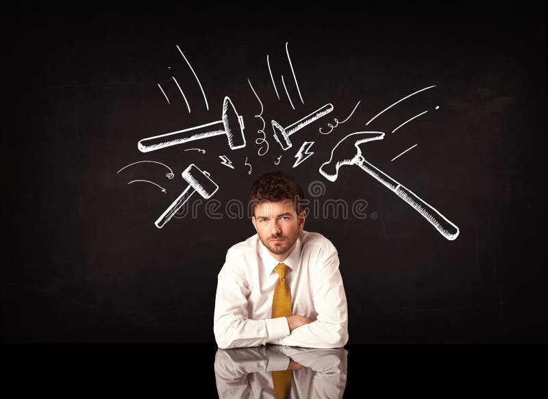 Depressed Businessman Sitting Under Hammer Marks Stock Photo - Image of ...