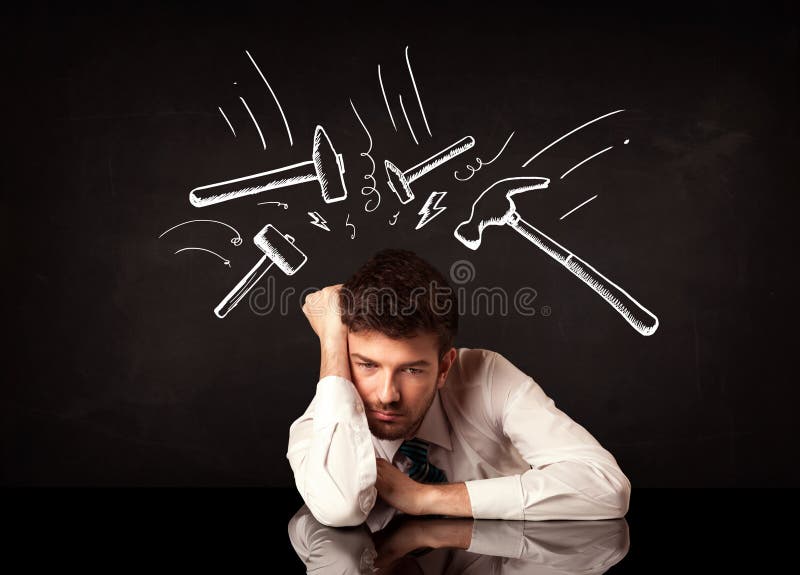 Depressed Businessman Sitting Under Hammer Marks Stock Photo - Image of ...