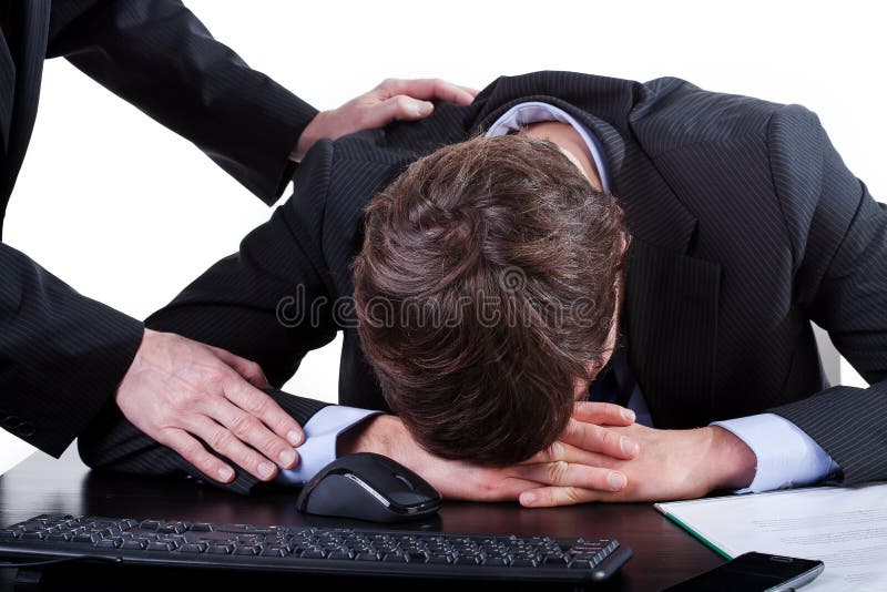 Depressed Businessman Sitting with Laptop at Desk in Office Stock Photo ...