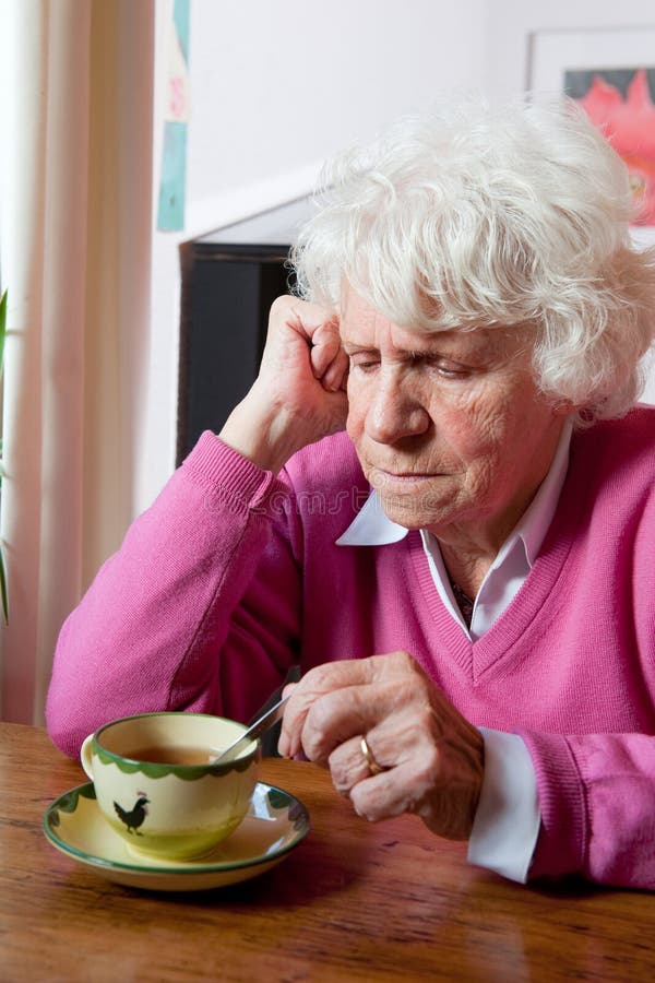 Depressed Elderly Woman Sitting at the Table Stock Photo - Image of ... Depressed Elderly Woman Sitting at the Table Stock Photo - Image of ...