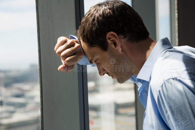 Depressed Man Leaning His Head Against A Wall Stock Image - Image of ...