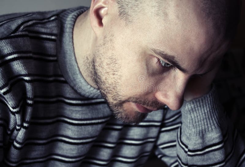 Depressed man stock photo. Image of sitting, sadness - 23156490