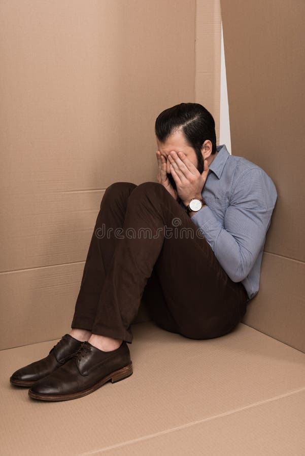 Depressed Man Crying in Box Stock Photo - Image of emotions, bearded ...