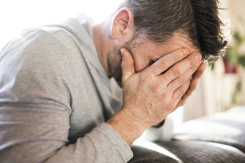 Depressed Man at Home on Couch Look Sad Stock Photo - Image of lonely ...