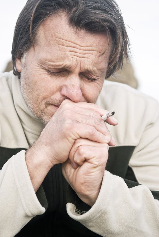 Depressed Man Smoking Cigarette Stock Photo - Image of mourn, lonely ...