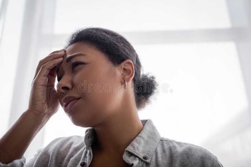 Depressed Multiracial Woman Touching Forehead Stock Photos - Free ...