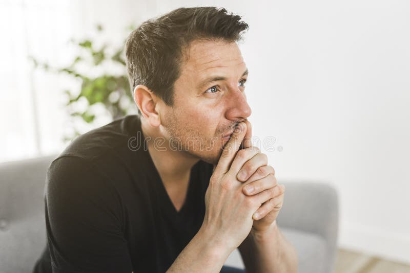 Depressed and Thinking Man Thinking at Home on Couch Stock Photo ...